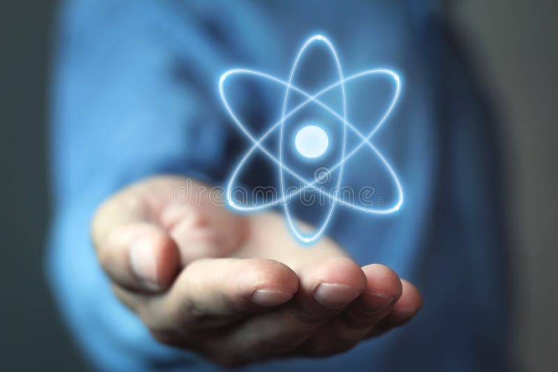 Caucasian Businessman Holding Atom. Power and Innovation Concept Stock ...