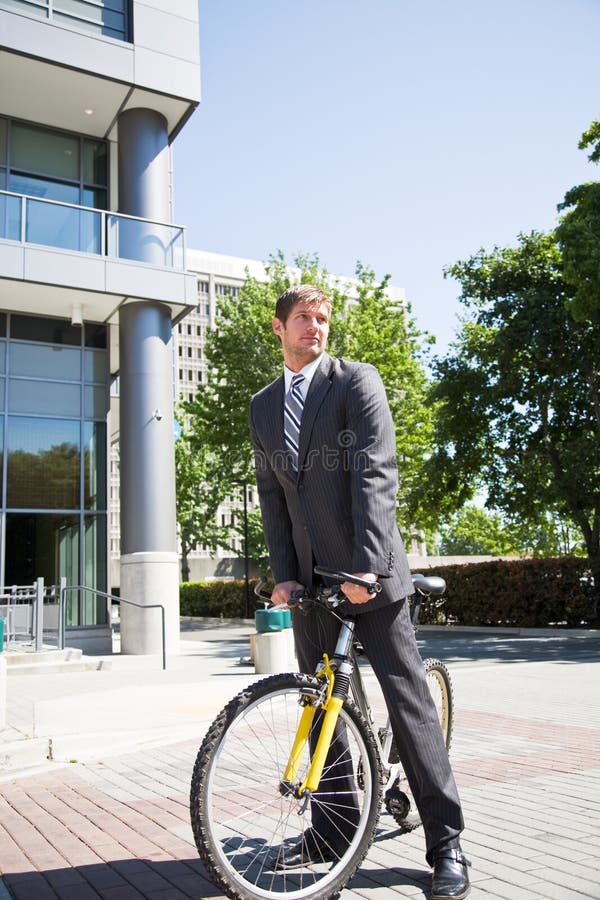 Caucasian Businessman Riding a Bike Stock Photo - Image of wear, bike ...
