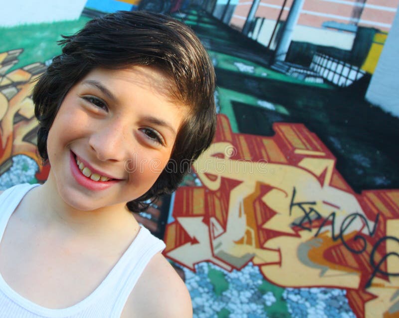 Caucasian Child on Graffiti Editorial Photo - Image of shot, expression ...
