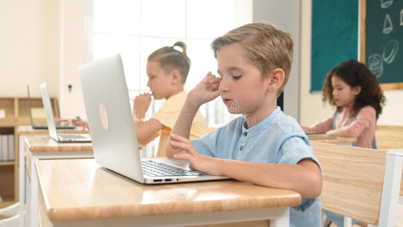 Caucasian Child Programing Software System and Learning about Coding ...