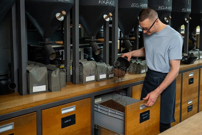 Caucasian Coffeemaker Working in Roasting Coffee Shop. Stock Photo ...