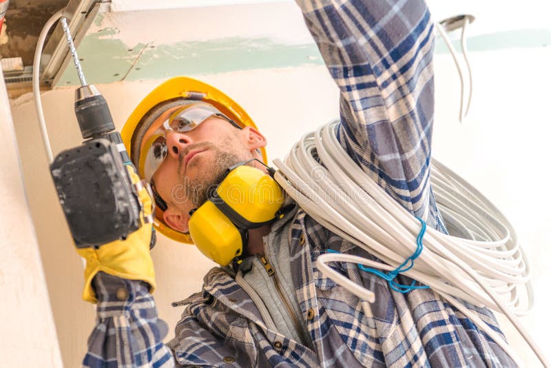Construction Worker with Cable Stock Image - Image of technology ...