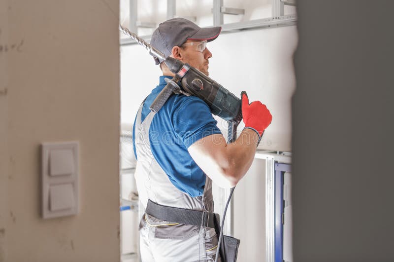 Worker with Heavy Duty Drill Stock Photo - Image of duty, drilling ...