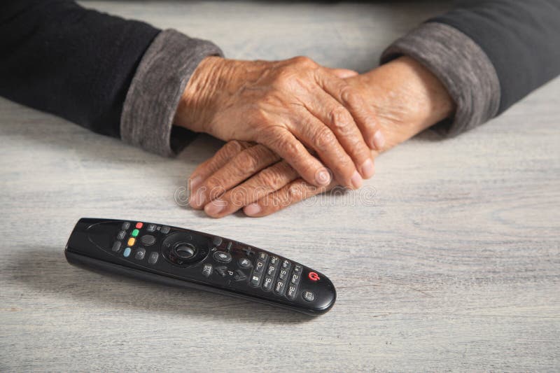 Caucasian Elderly Female Hand with a Tv Remote Controller Stock Image ...