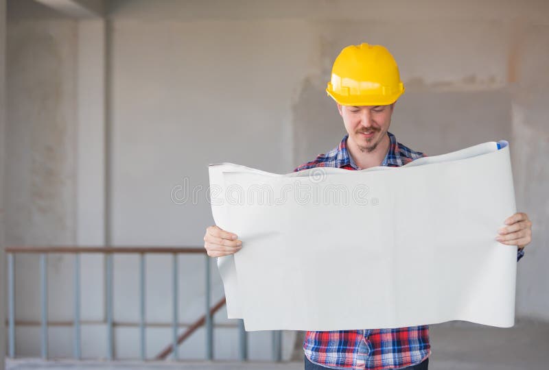 Engineer Reading Plan on Blueprints Stock Image - Image of office ...