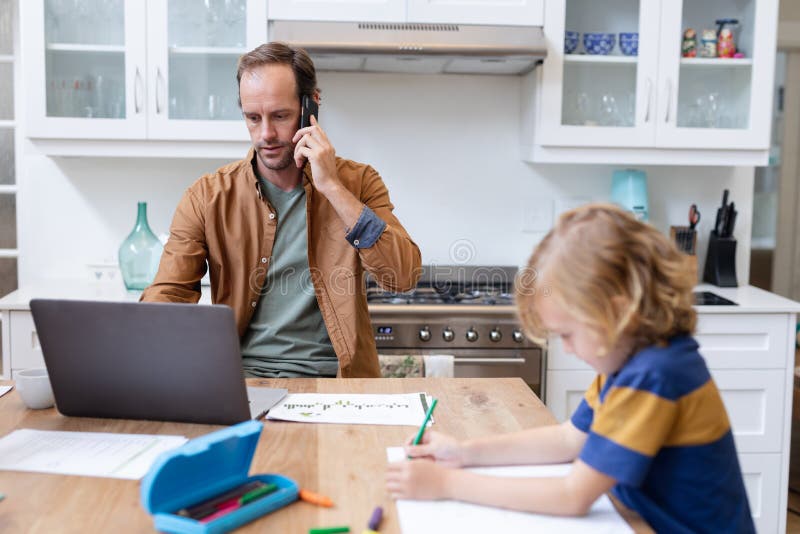 Father and Son Working with Plans at Home Stock Image - Image of home ...
