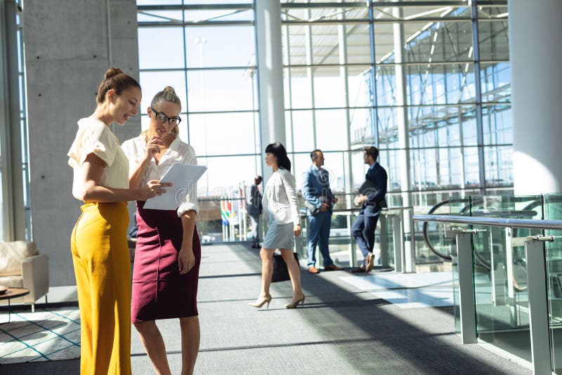 Executives Looking Out of Office Window. Stock Image - Image of indoors ...