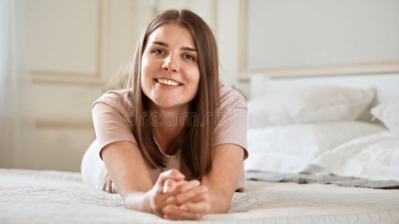 Caucasian Female Posing Lying on the Bed Stock Photo - Image of female ...
