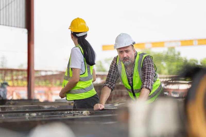 Caucasian Foreman Worker Team Checking Project at the Precast Concrete Factory Site, Engineers ...