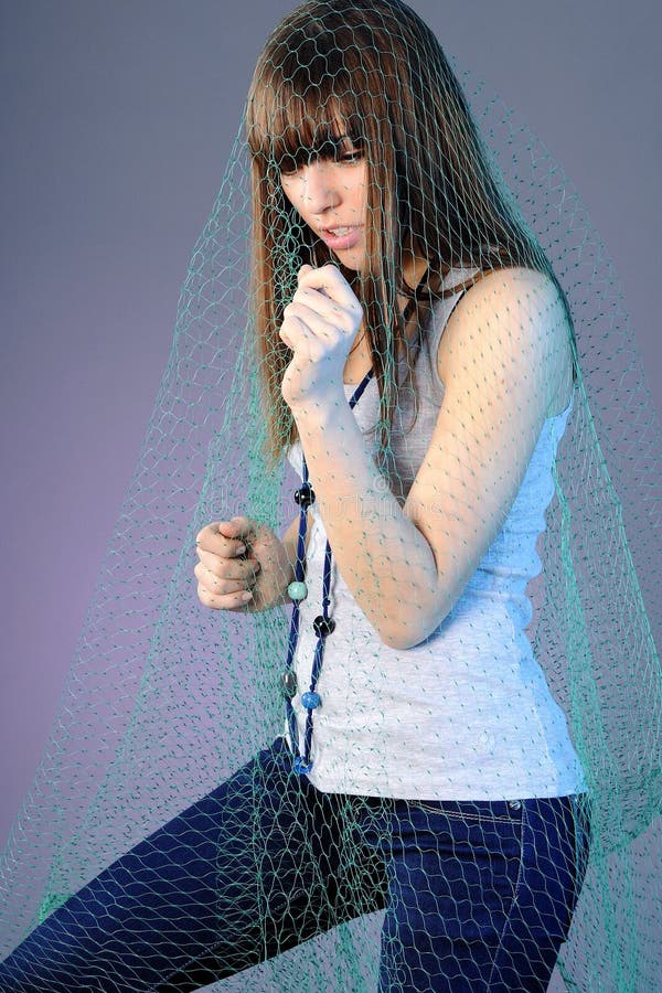 Caucasian girl in netting stock photo. Image of netting - 12993768