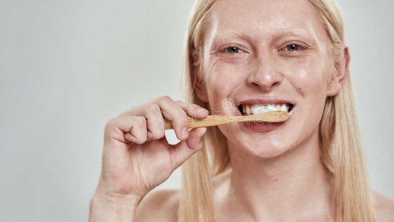 Caucasian Guy Brushing His Teeth with Toothpaste Stock Image - Image of ...