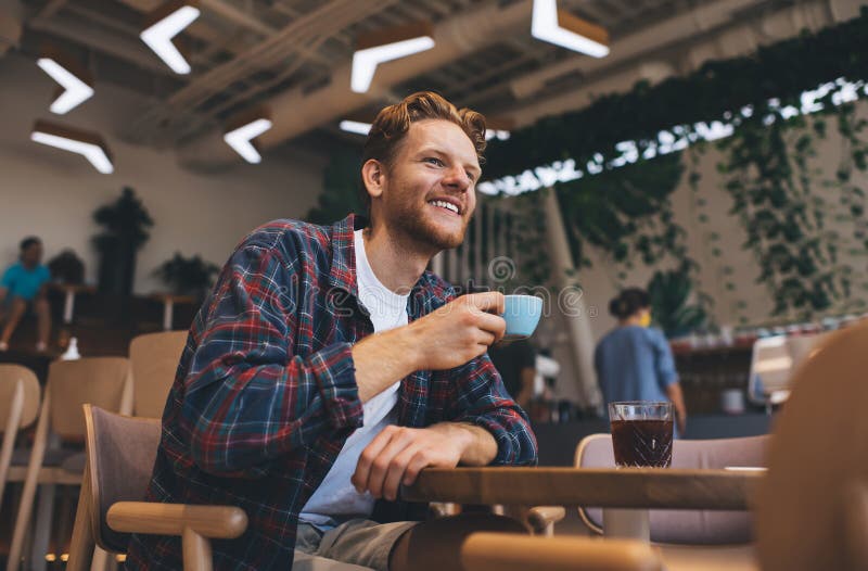 Caucasian Guy Drinking Tea or Coffee at Table Stock Photo - Image of ...