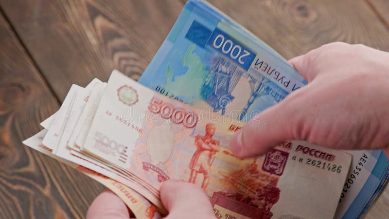 Caucasian Hand Counting Small Stack of Russian Ruble Banknotes Stock ...