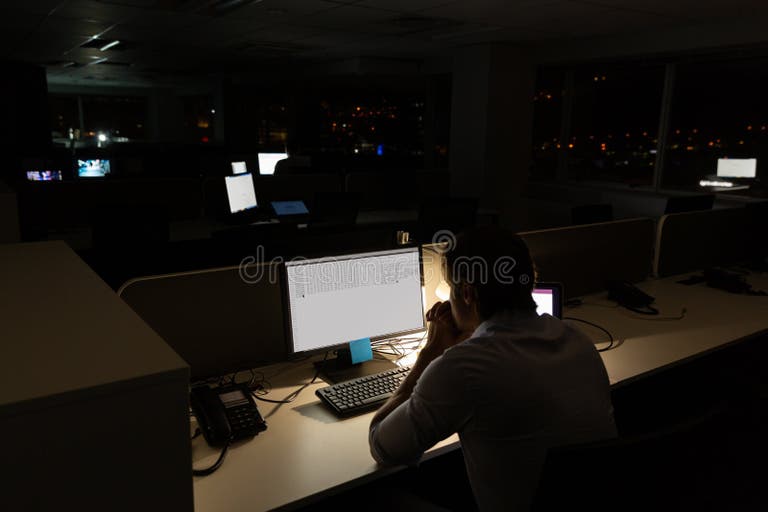 Caucasian Male Programmer Sitting at Desk, Using Computer with Coding on Screen Stock Image ...