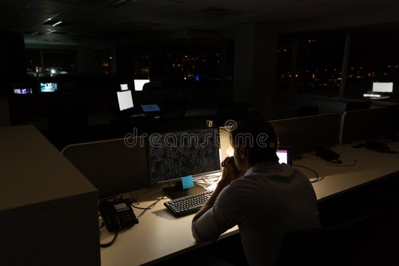 Caucasian Male Programmer Sitting at Desk and Using Computer with Coding on Screen Stock Image ...