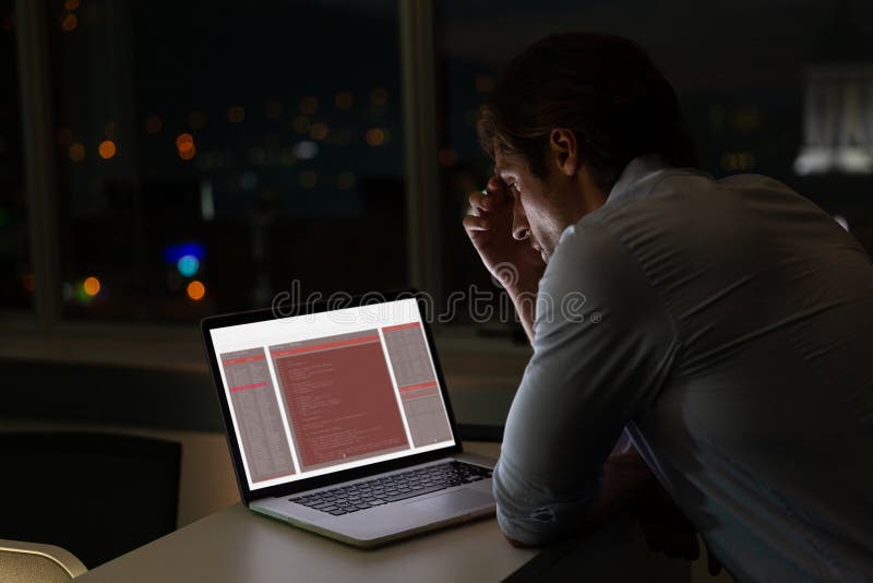 Caucasian Male Programmer Sitting at Desk, Using Laptop with Coding on Screen Stock Image ...