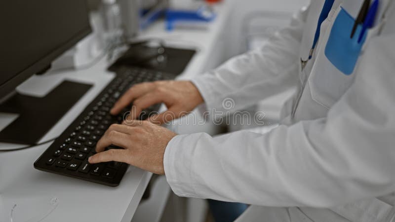 Caucasian Male Researcher Typing on Keyboard in a Modern Laboratory ...