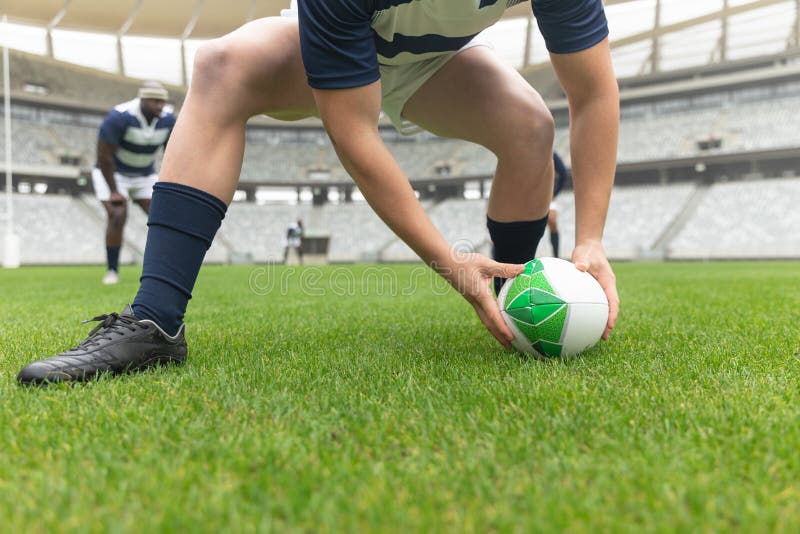 Caucasian Male Rugby Player Playing Rugby Match in Stadium Stock Photo ...