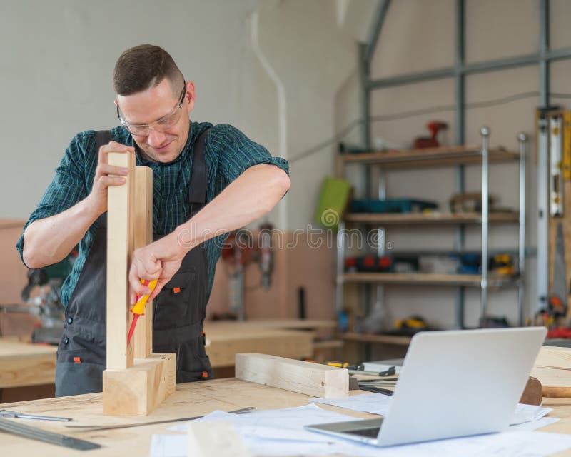 Caucasian Man Assembling a Table with a Screwdriver. Stock Photo ...