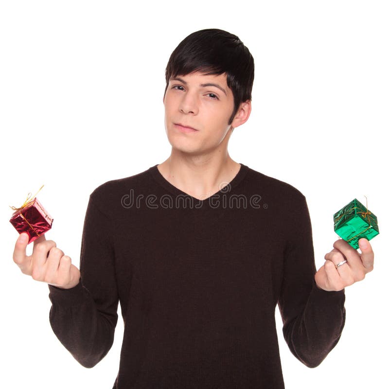 Caucasian Man Comparing Green Present To Red Stock Image - Image of ...