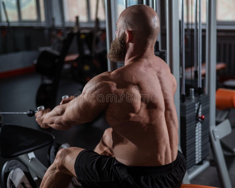Caucasian Man Doing Rowing Exercises on a Rowing Machine. Stock Image ...