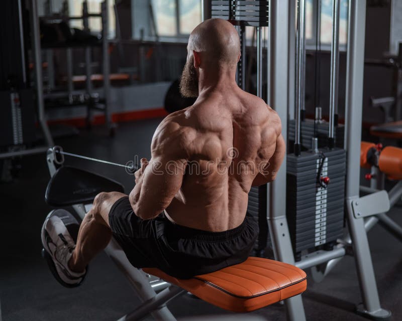 Caucasian Man Doing Rowing Exercises on a Rowing Machine. Stock Image ...