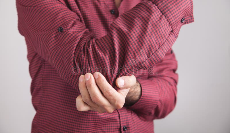 Caucasian Man with Elbow Pain. Pain Relief Concept Stock Image - Image ...