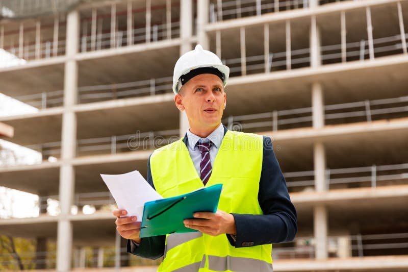 Engineer Man Analysing Project Documentation Outdoors Stock Image ...