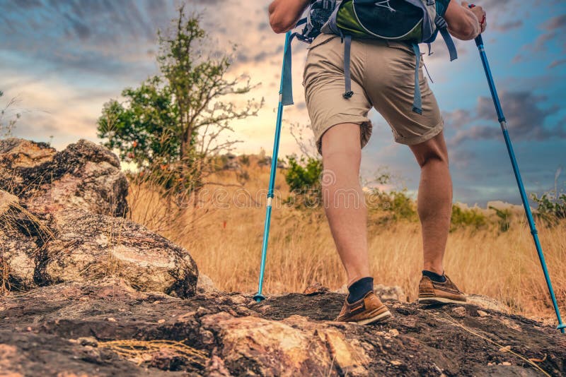 Caucasian Man Hiker Having Fun Walking Up Mountain on Trail with Dry ... Caucasian Man Hiker Having Fun Walking Up Mountain on Trail with Dry ...
