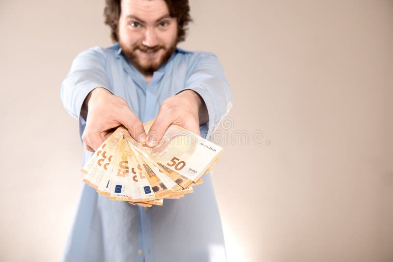 Man Holds Bundle 50 Euro Notes Both Hands Stock Photos - Free & Royalty ...