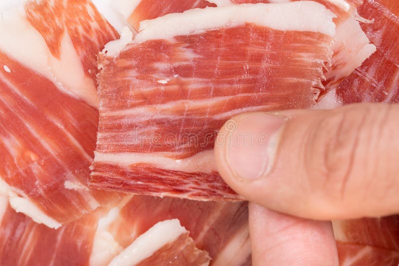 Top View of Caucasian Man Hand Taking Serrano Ham Slice on White Stock ...