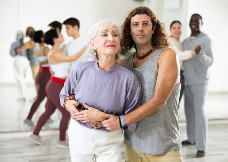 Caucasian Man and Mature Woman Rehearsing Latin Paired Dance Moves ... Caucasian Man and Mature Woman Rehearsing Latin Paired Dance Moves ...