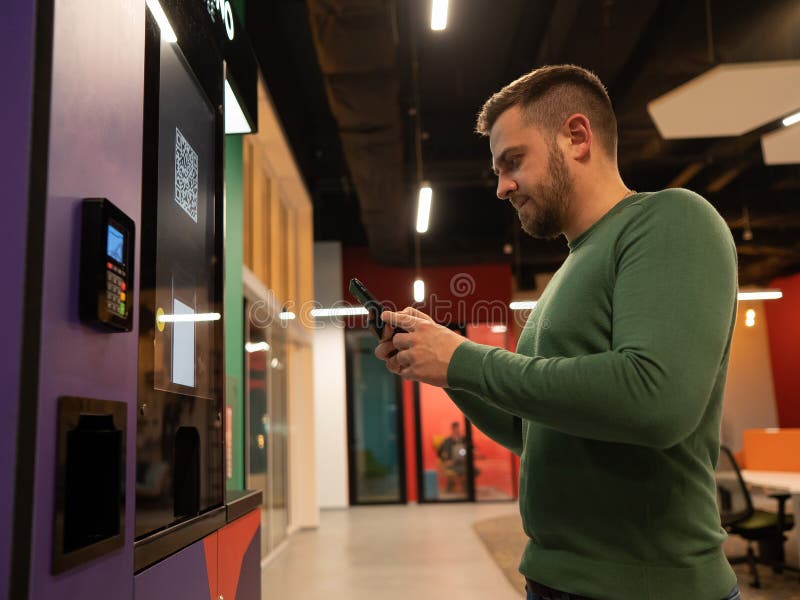 Caucasian Man Pays by Smartphone for Coffee in Self-service Machine ...