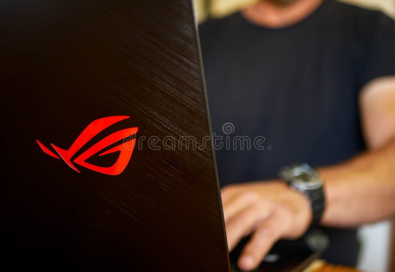 Caucasian Man Playing on Asus Rog Laptop Computer. Editorial Photo ...