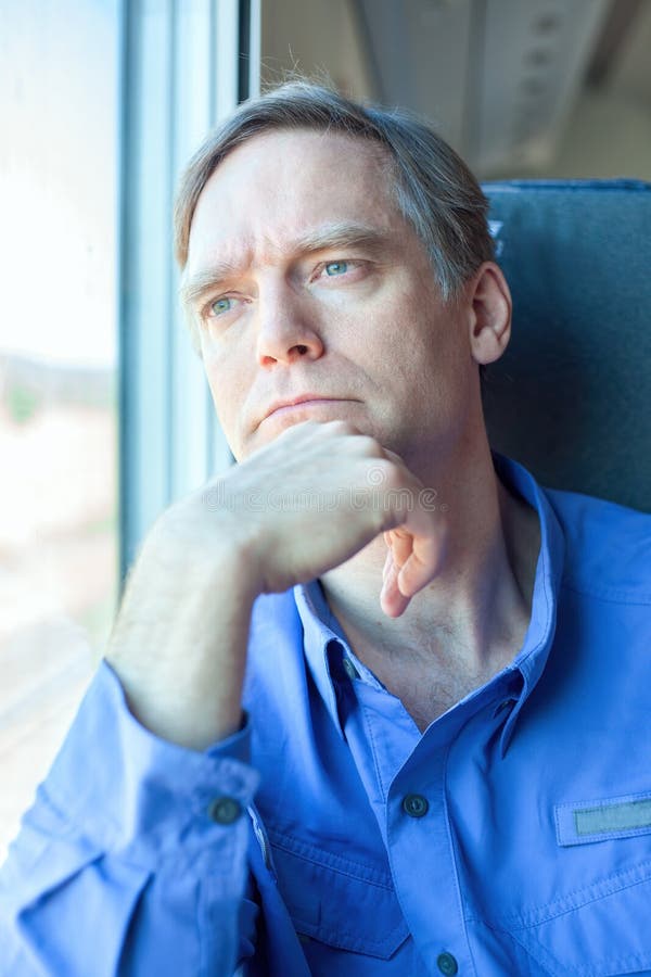 Man Looking Out Train Window Thinking Stock Photos - Free & Royalty ...