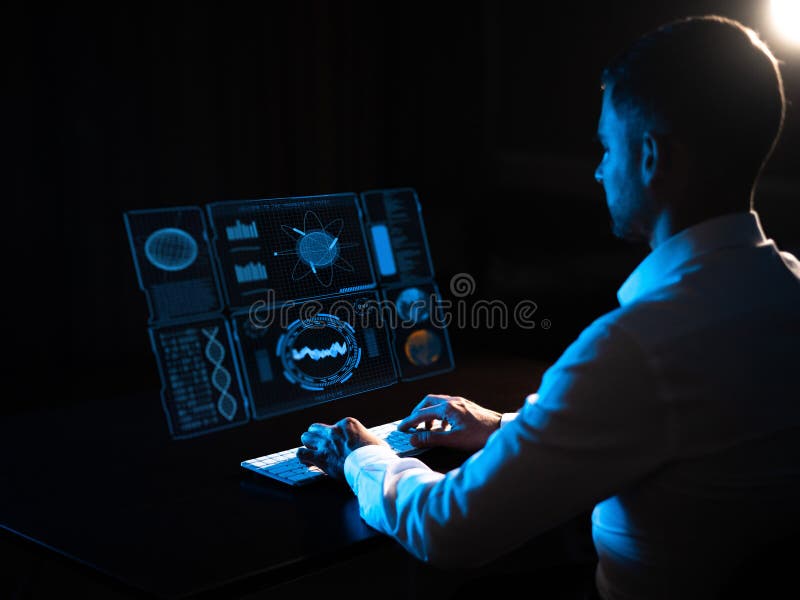 Caucasian Man Sitting in the Dark in Front of a Virtual Screen and ...