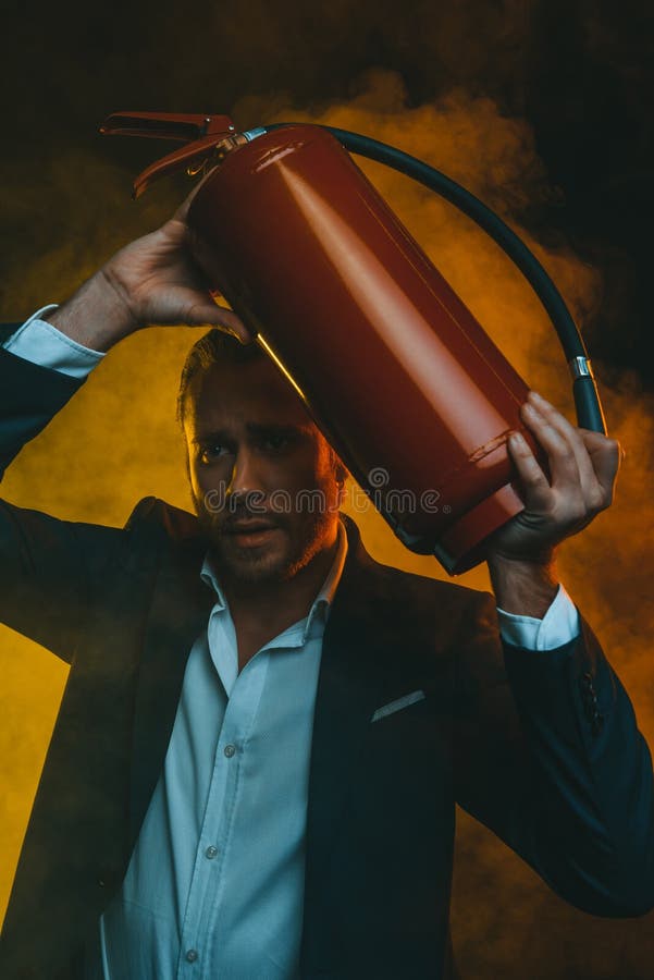 Caucasian Man in Suit Holding Fire Extinguisher Stock Image - Image of ...