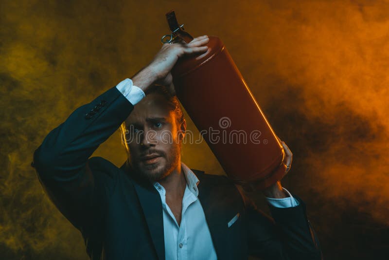 Caucasian Man in Suit Holding Fire Extinguisher Stock Image - Image of ...