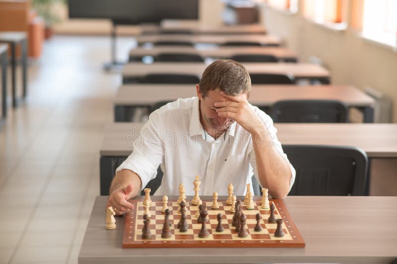 Caucasian Man Thinking about a Chess Move. Stock Image - Image of ...