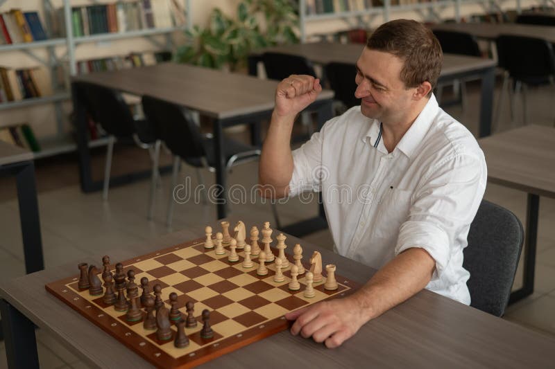 Caucasian Man Thinking about a Chess Move. Stock Photo - Image of ...