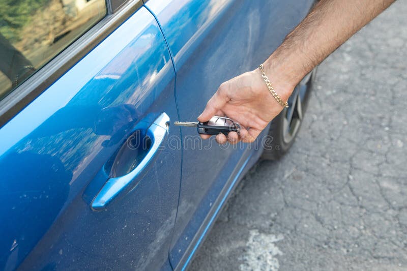 Caucasian Man Unlocking Car Using Key Stock Photo - Image of auto ...