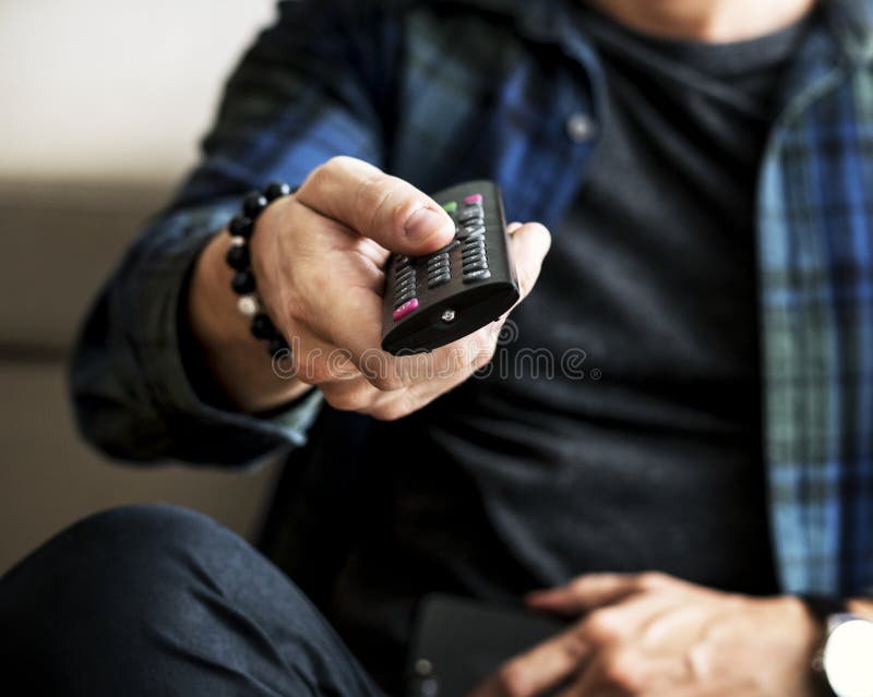 Caucasian Man Using Tv Remote Controller Stock Image - Image of ...