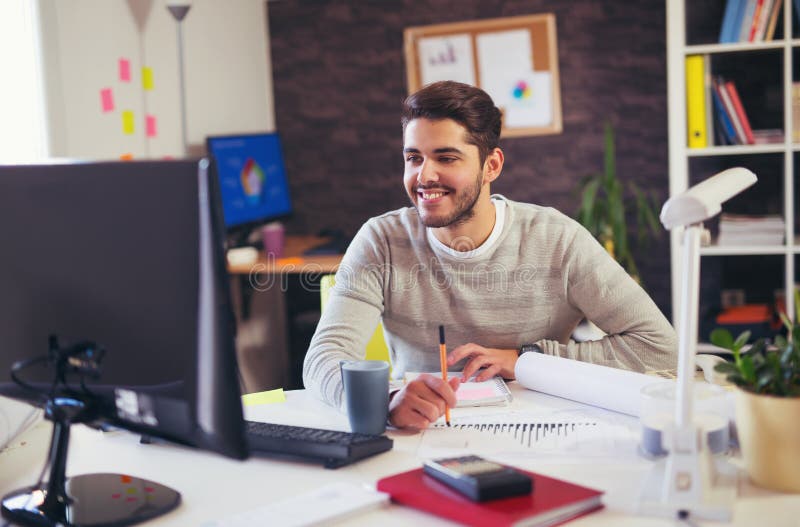 Caucasian Man at Work Desk Facing Flat Screen Computer Stock Photo ...