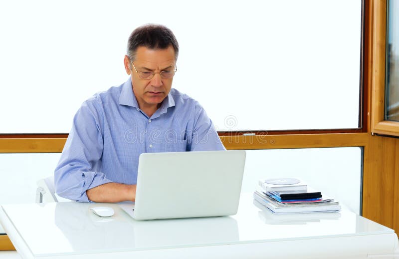 Caucasian Man Working on His Laptop Computer. Stock Photo - Image of ...