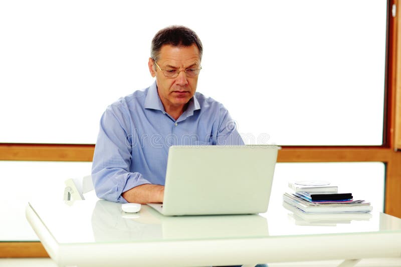 Caucasian Man Working on His Laptop Computer. Stock Photo - Image of ...