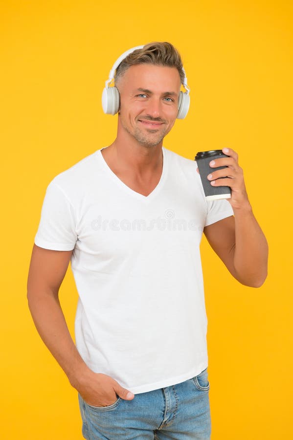 Caucasian Middle Aged Man Drink Takeaway Coffee Listening To Music In