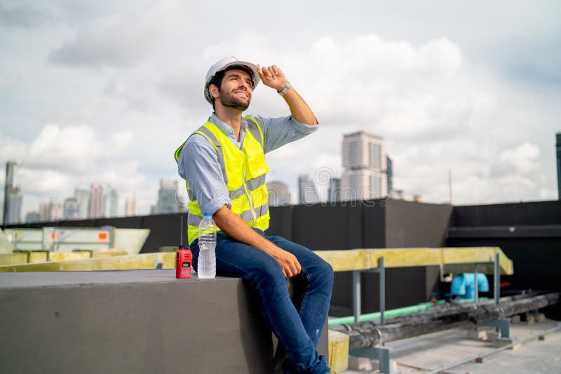 Caucasian Professional Engineer or Technician Sit on Terrace of ...