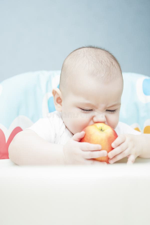 Caucasian Rosy-cheeked Tot Eating Apple Stock Image - Image of adorable ...