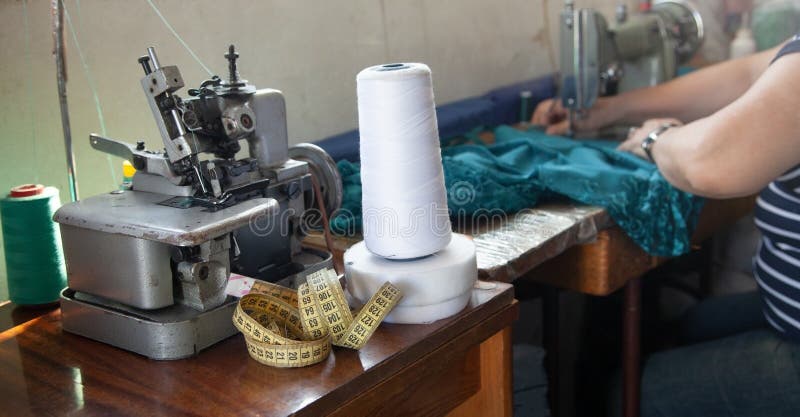 Caucasian Seamstress Working with Sewing Machine Stock Photo - Image of ...