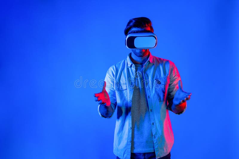 Caucasian Smart Man Holding and Moving Gesture while Using VR Goggle ...